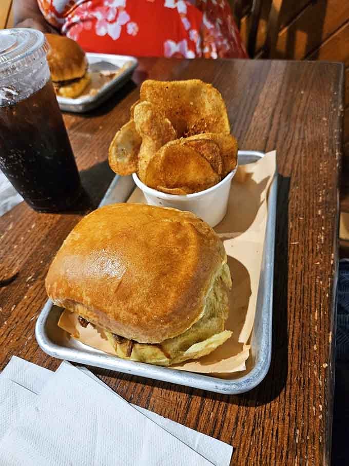 Pulled pork and house-made chips at Local Smoke BBQ deliver comfort food that earned its championship stripes.