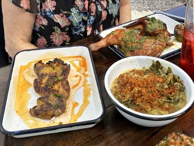 Who knew collards could look this good? Paired with perfectly grilled chicken, this is comfort food with a passport.