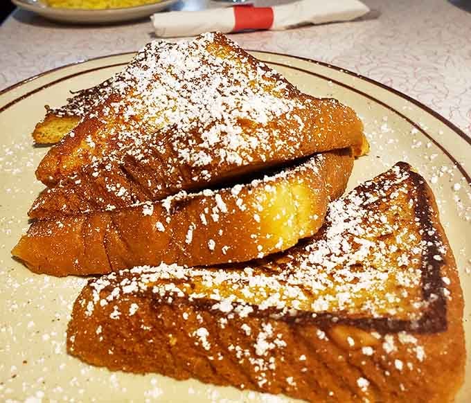 French toast dusted with powdered sugar and perfectly golden-brown will make you forget all about your diet plans.