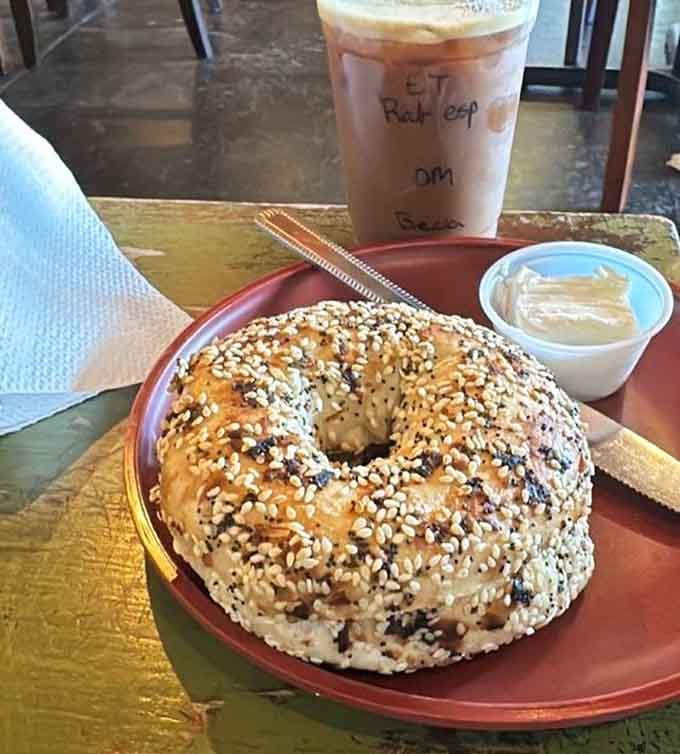 That everything bagel isn't messing around, loaded with seeds like it's preparing for some serious carb-fueled adventures ahead.