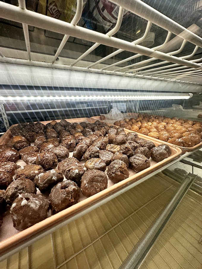 Donut balls lined up like little spheres of temptation, ready to convince you that portion control is just a suggestion.