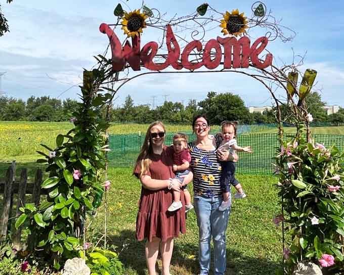 The welcome arch sets the tone for a visit that's equal parts Instagram opportunity and genuine agricultural appreciation.