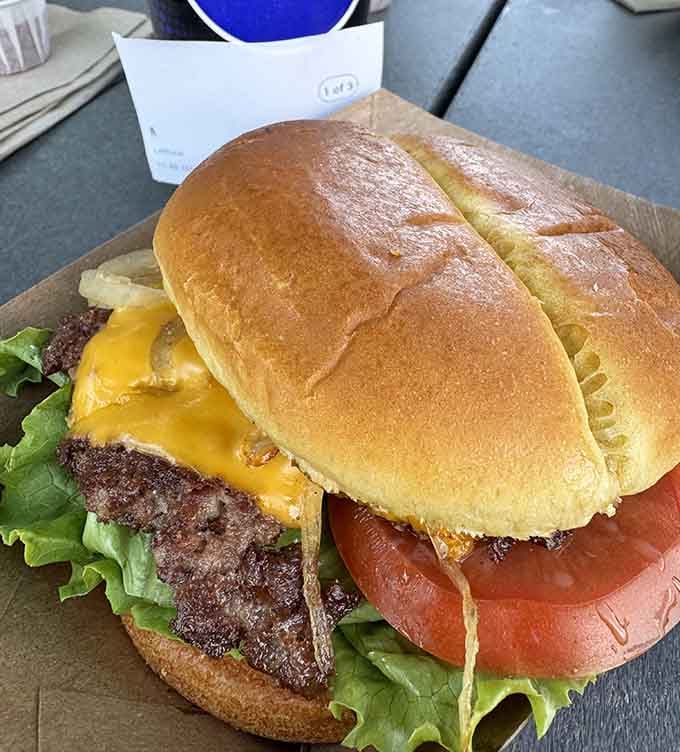 Behold the Mama Burger: juicy patty, melted cheese, and toppings that understand the assignment perfectly every time.