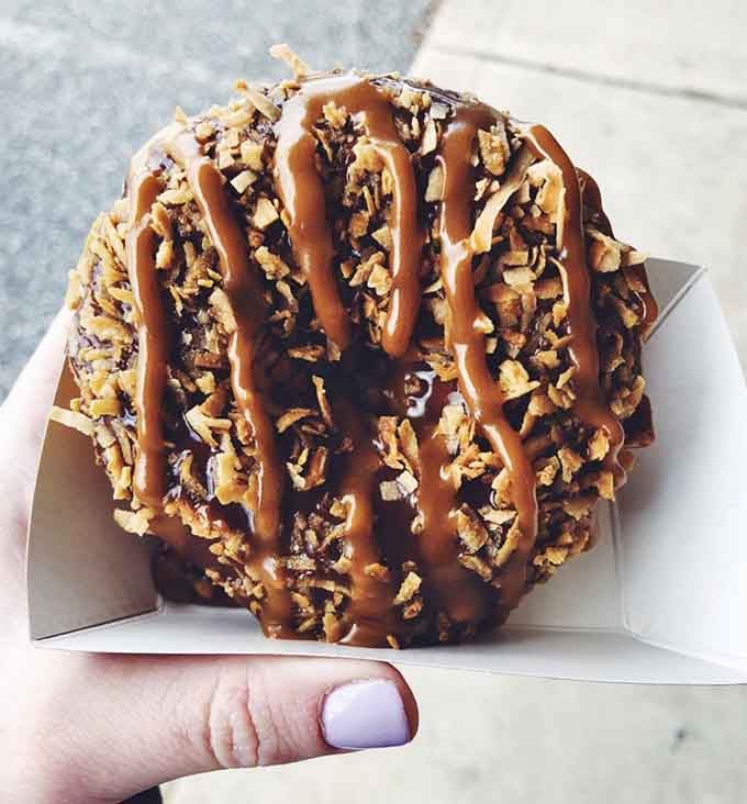 Caramel drizzle and crushed cookies create a masterpiece that would make any Girl Scout cookie jealous of its year-round availability.