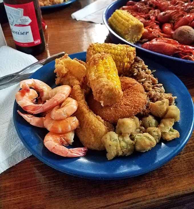 Corn on the cob, golden fried catfish, okra, and shrimp prove that seafood buffets can absolutely shine inland.