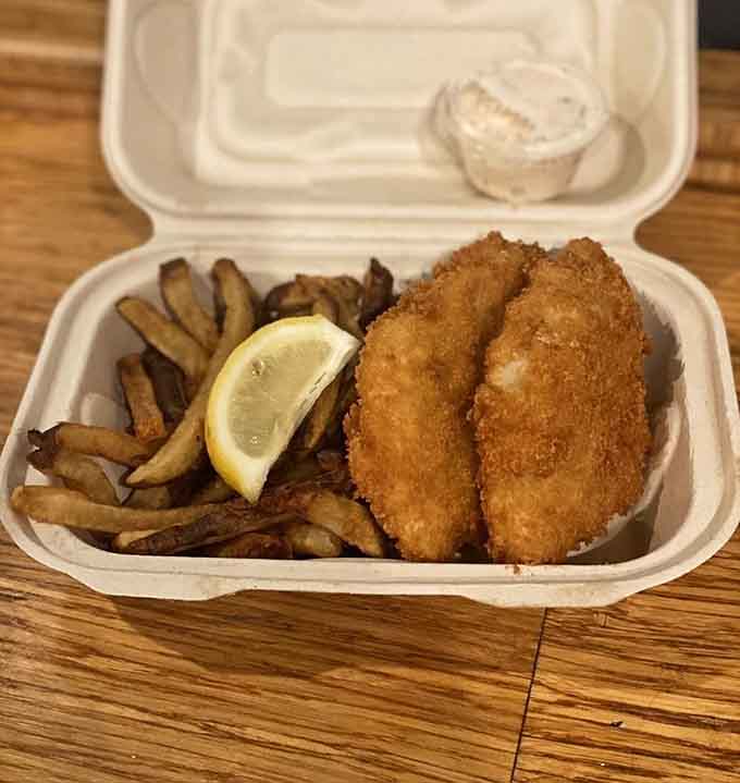 Golden-crusted fish and fries proving that beer batter makes everything better, scientific fact.
