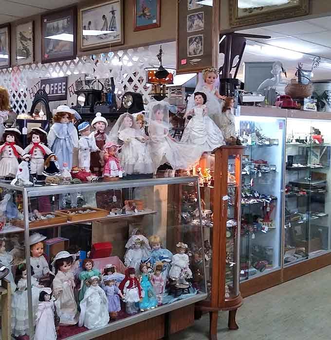 These porcelain dolls have seen more decades than most of us, still dressed for fancy occasions.