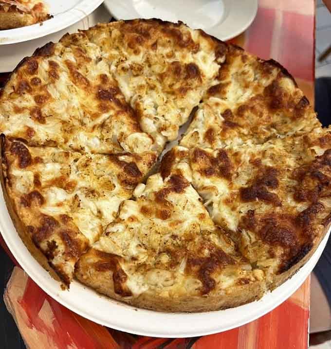 The crab pie is Baltimore on a plate&mdash;sweet crabmeat meeting melted cheese in perfect harmony.