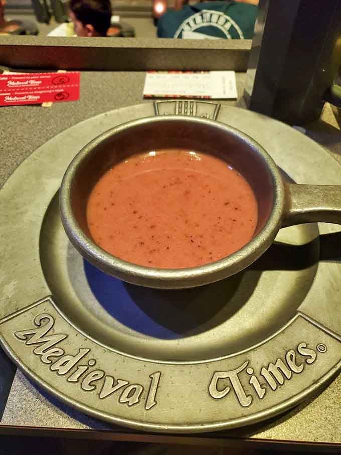 Tomato bisque served in a bowl you drink from directly, making you feel like a Viking with better table manners.