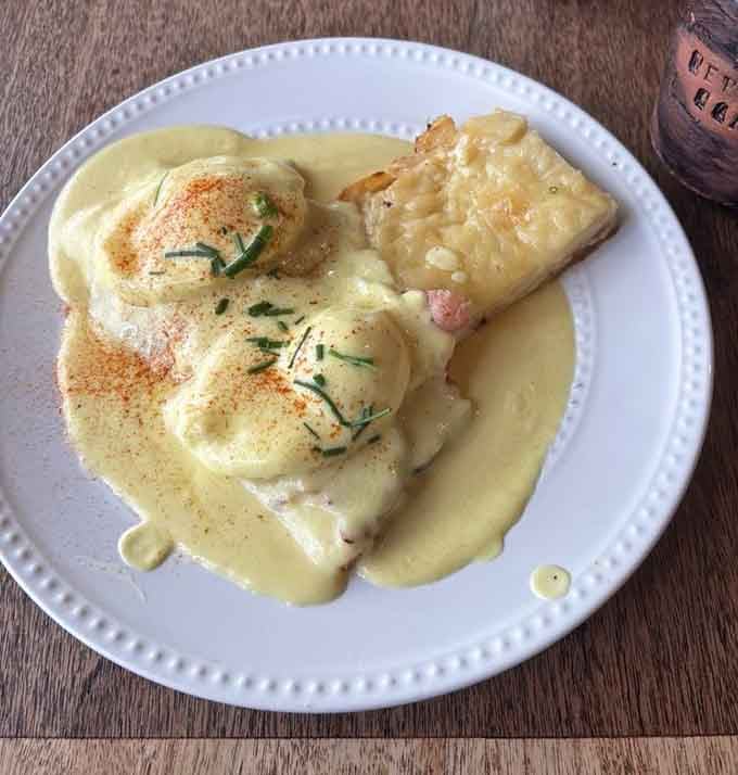 Traditional eggs benedict elevated to art form, because sometimes the classics need no improvement, just perfection.