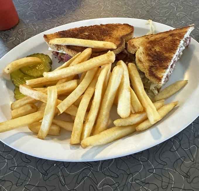 The Reuben arrives with enough fries to share, though you absolutely won't want to do that.