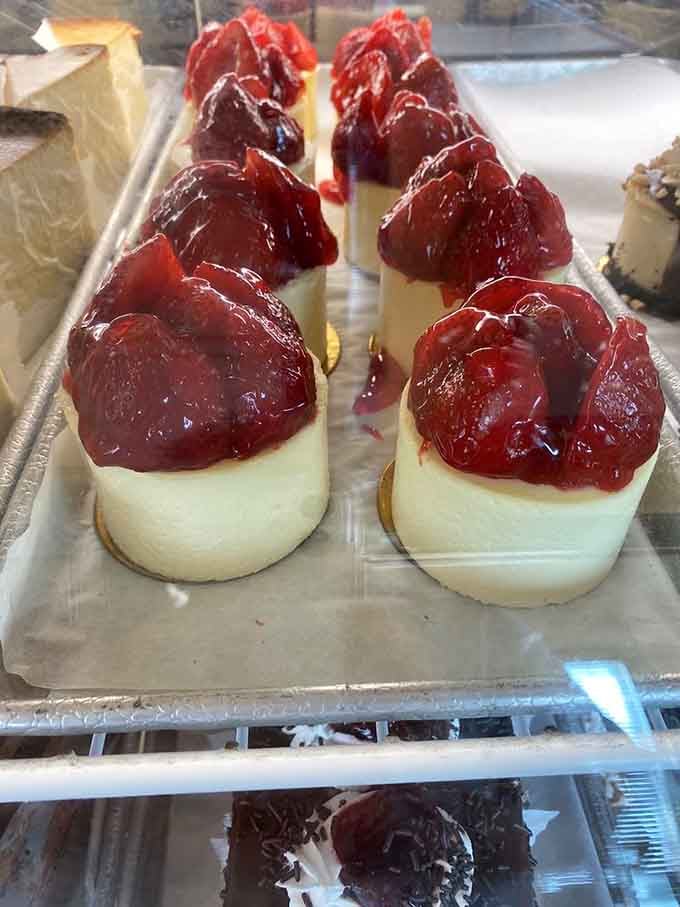 Strawberry-topped cheesecake slices that make you forget every diet you've ever considered starting tomorrow.