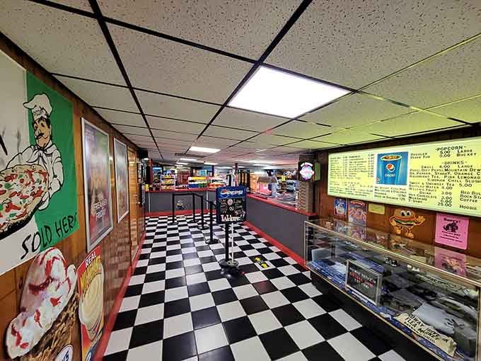 Classic black-and-white checkered floors and vintage popcorn machines make this concession stand absolutely picture-perfect inside.