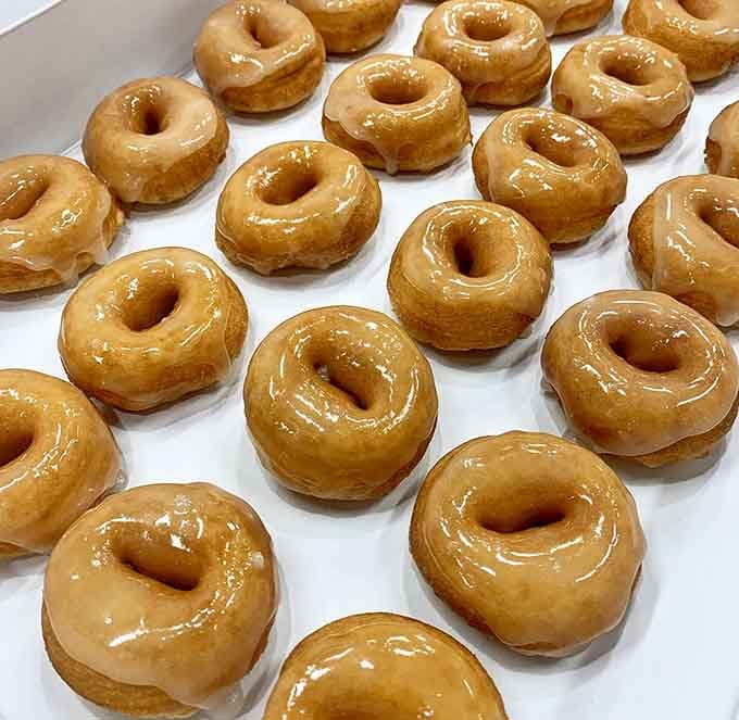 Glazed perfection lined up like golden soldiers ready to march straight into your heart and stomach simultaneously.