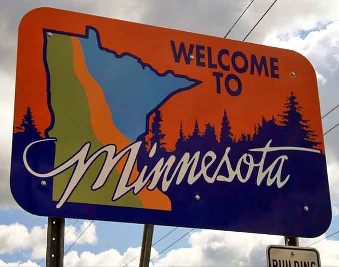 Even the sunset can't compete with the sheer audacity of welcoming you to a completely different state.