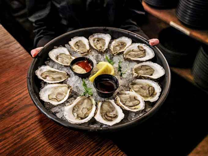 Fresh oysters on ice, because nothing says "I'm living my best brunch life" quite like slurping shellfish before noon.