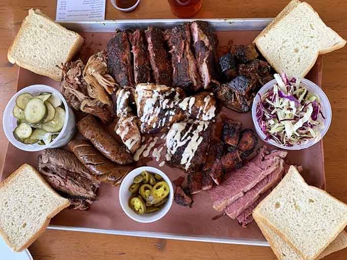 This magnificent meat board is basically a barbecue symphony performed on butcher paper, no conductor required.