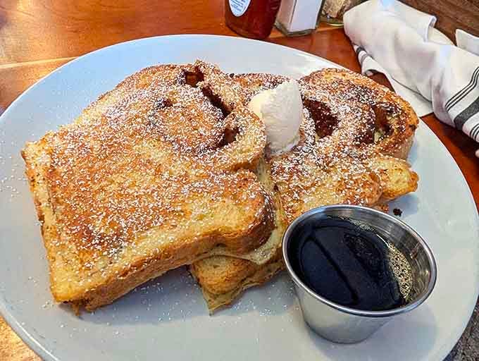 French toast dusted with powdered sugar and ready for syrup, because some mornings demand pure indulgence.