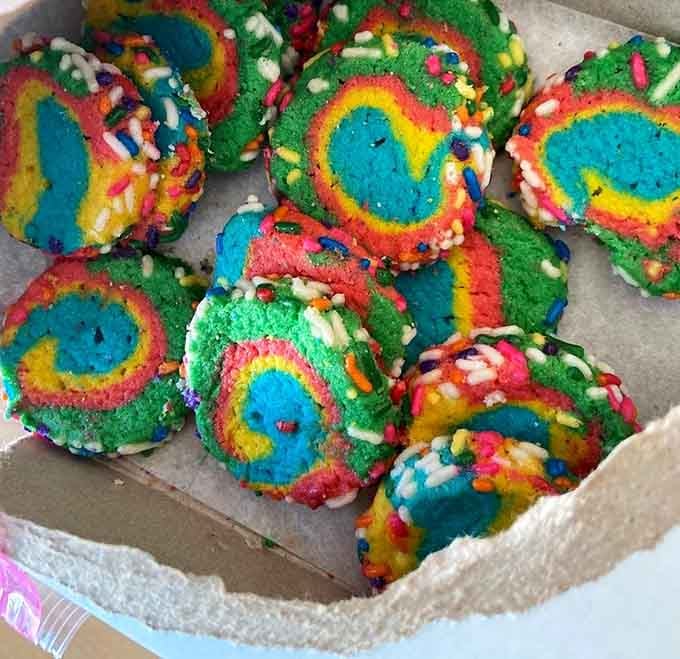 Rainbow cookies that look like they escaped from a particularly joyful celebration, and honestly, good for them.