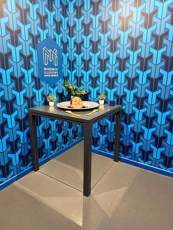 Your head on a platter makes for surprisingly cheerful photos, proving dark humor never goes out of style.