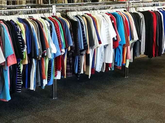 A rainbow of t-shirts organized by color makes finding your perfect shade easier than picking your favorite ice cream flavor.