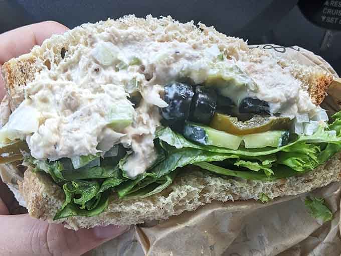 Creamy tuna salad piled high with fresh greens and vegetables proves that classic combinations never go out of style.