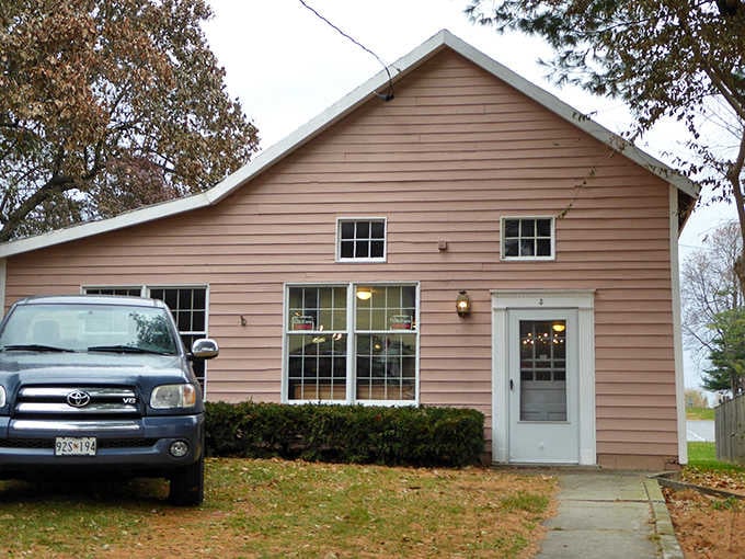 Sometimes the best antique shops are hiding in buildings that look like someone's beloved grandmother's house from the outside.