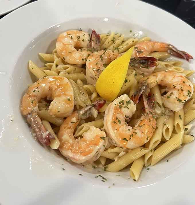 Shrimp scampi over penne that'll make you forget you came here for pizza (but only temporarily).