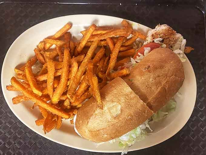 Golden fries and a sandwich so stuffed it's practically bursting with pride make this plate a work of art.