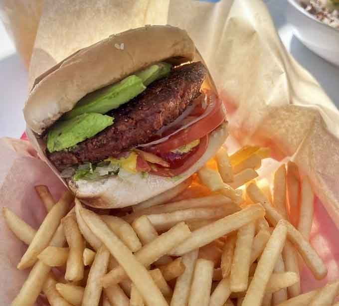 That thick veggie patty topped with fresh avocado proves meatless options can be just as satisfying and flavorful.