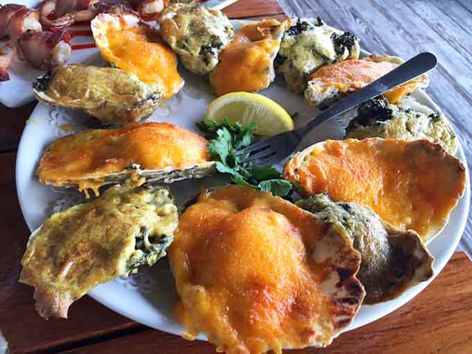 Baked oysters topped with colorful, bubbling goodness that'll make you forget raw was ever your only option.