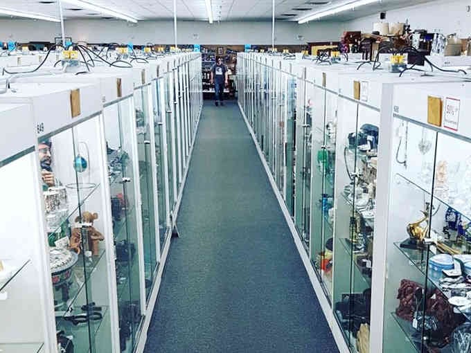 Endless aisles of glass-enclosed treasures stretch before you like the world's most organized time machine adventure.