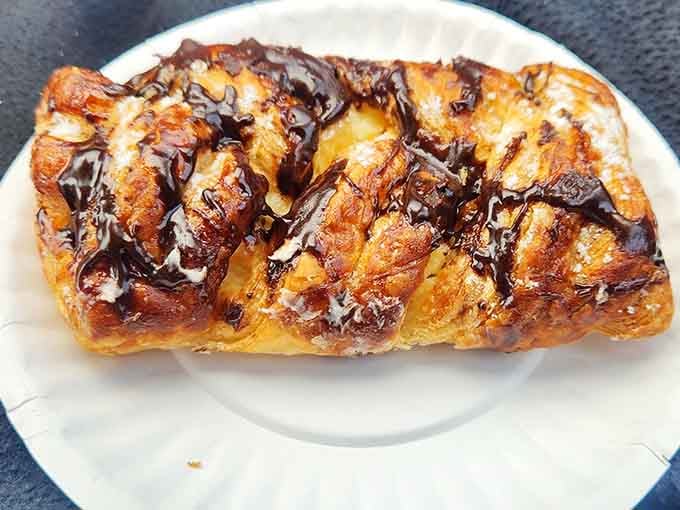 Chocolate drizzled over buttery Danish layers, this pastry makes you understand why people set alarms in the dark.