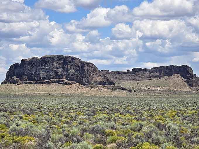 Fort Rock rises from the desert like nature's amphitheater, ready to host the world's most epic outdoor concert that never was.