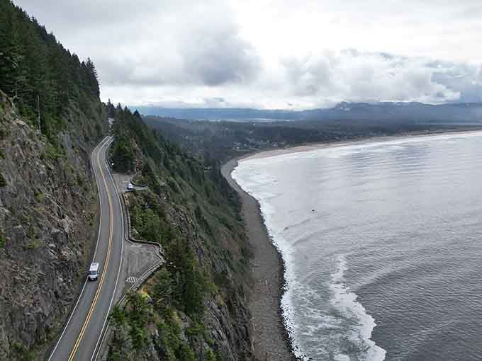 Highway 101 hugs the coastline here like it's afraid of heights, offering drivers white-knuckle views worth every nervous moment.