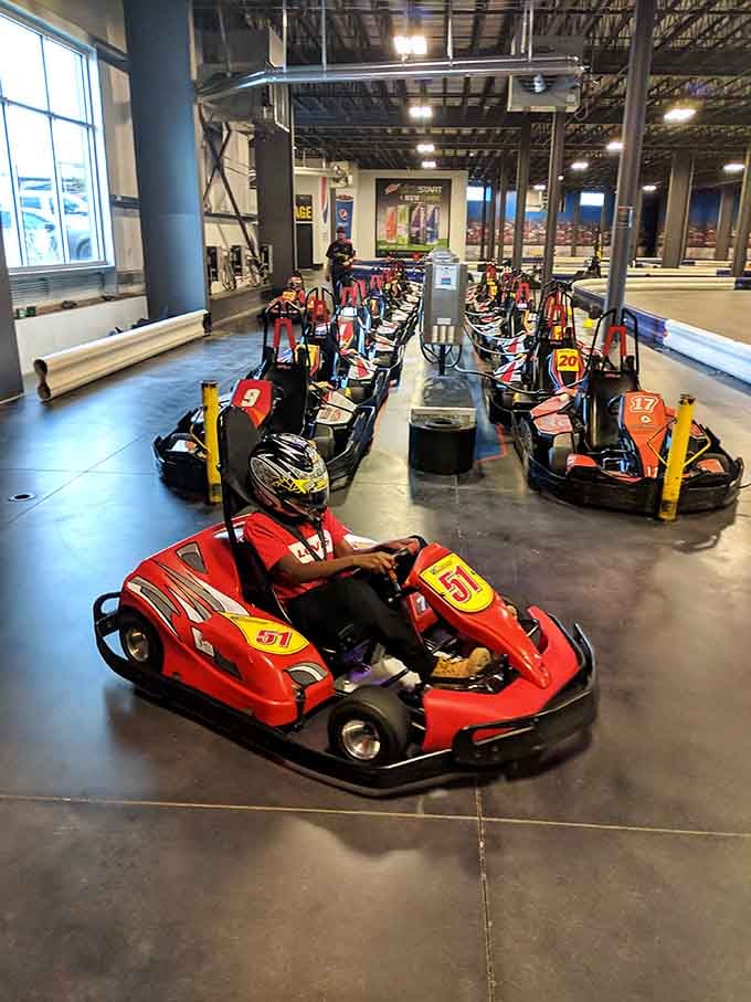 Rows of electric karts stand ready to transform ordinary folks into temporary speed demons.