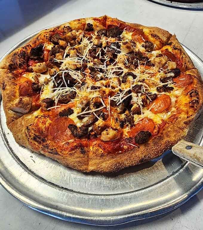 This pizza's got more toppings than a T-Rex has teeth, and it's significantly more delicious.