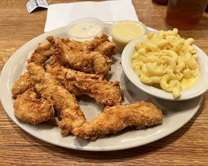 Golden chicken tenders with mac and cheese: proof that some childhood favorites never need to grow up.