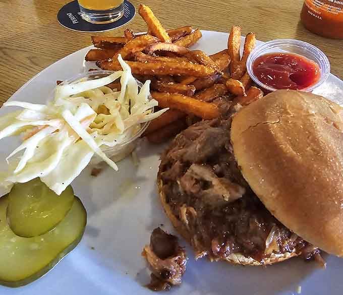 Beef brisket sandwich with sweet potato fries proves that simple done right beats fancy every time.