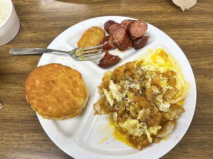 Biscuits, sausage, and scrambled eggs: the holy trinity of Southern breakfast done absolutely right.