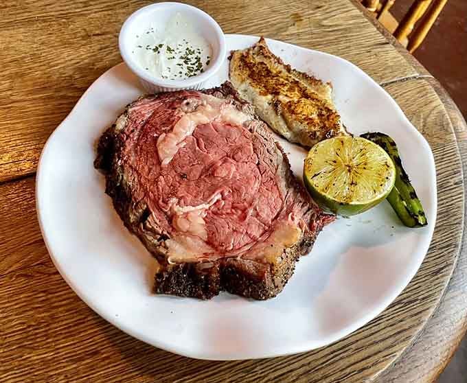 Prime rib so perfectly cooked it practically moos at you, paired with catfish that proves surf and turf works everywhere.