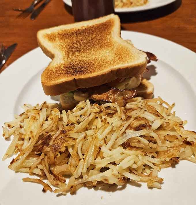 That towering double cheeseburger isn't messing around, and neither are those golden fries begging to be devoured.