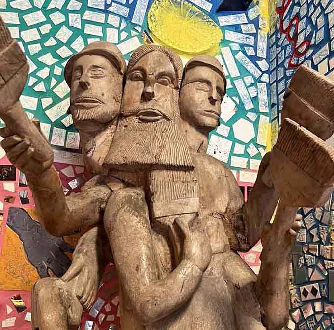 This three-faced folk sculpture radiates personality, like Mount Rushmore decided to get funky and join the counterculture movement.