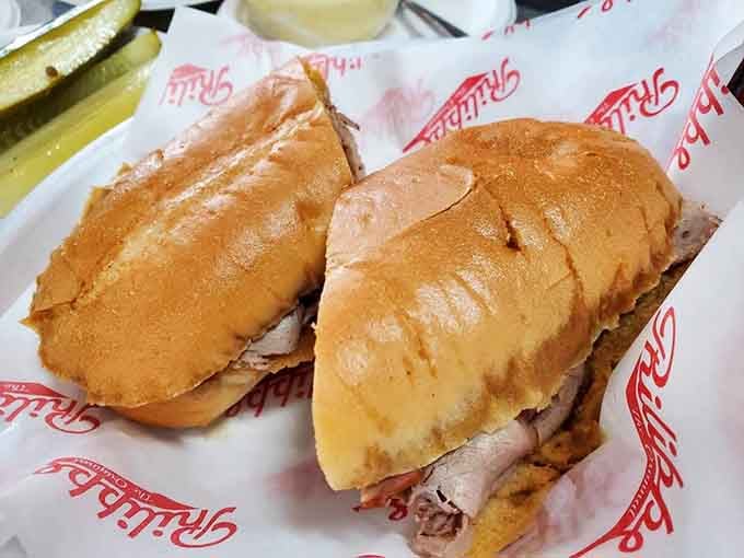 The pork dip proves that not all heroes wear capes; some come wrapped in juice-soaked French rolls.