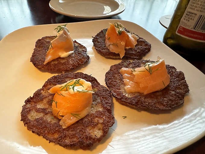 Crispy potato pancakes topped with smoked salmon, because sometimes Eastern European cuisine gets unexpectedly fancy on you.