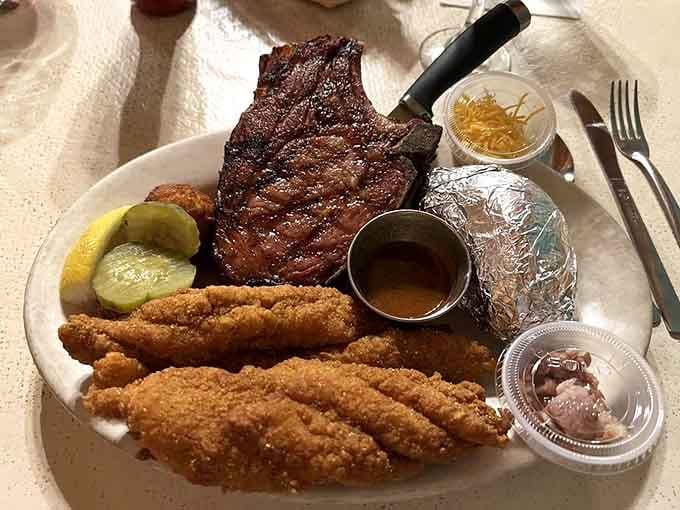Surf meets turf with golden fried shrimp alongside a thick pork chop that's earned its local legend status.