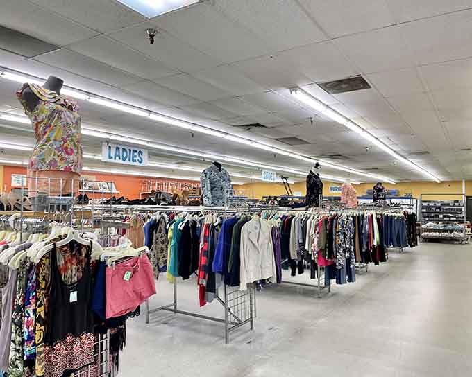 Racks stretching into the distance hold more wardrobe possibilities than your closet has room for, honestly.