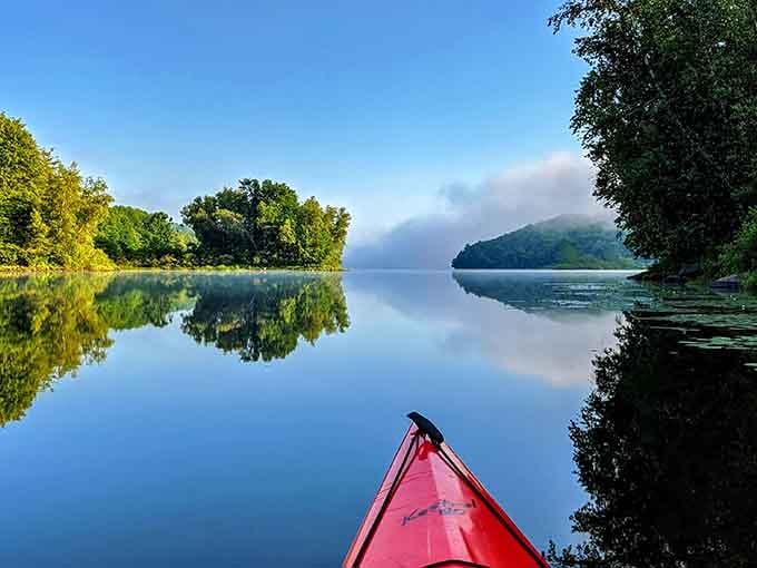 Morning mist on glass-smooth water: nature's way of reminding you that some things can't be improved upon.