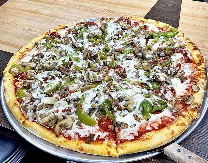 This loaded pizza proves that sometimes more is actually more, especially when hunger strikes with serious intent.