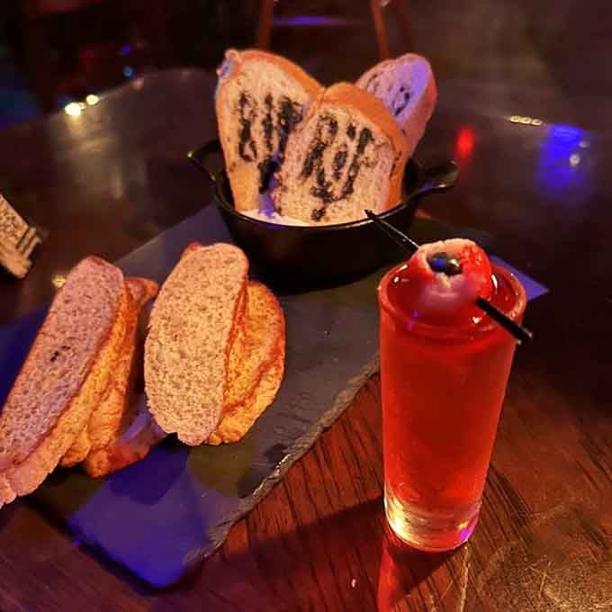 Spinach dip and a crimson cocktail that looks like it came straight from a vampire's personal collection.